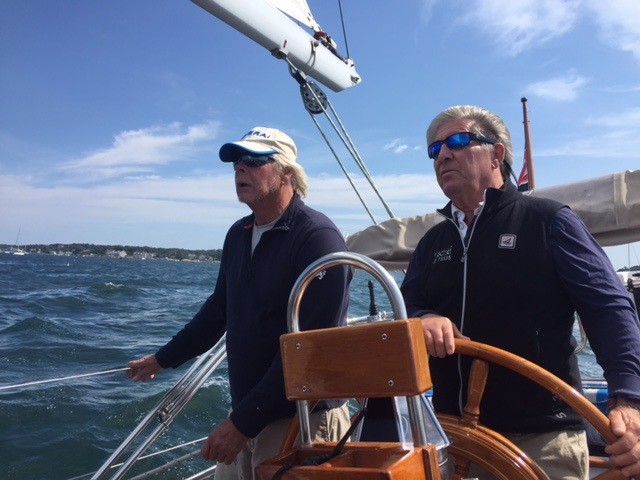 Fred Shrigley at the helm with Bill Gilmore on the main sheet ...